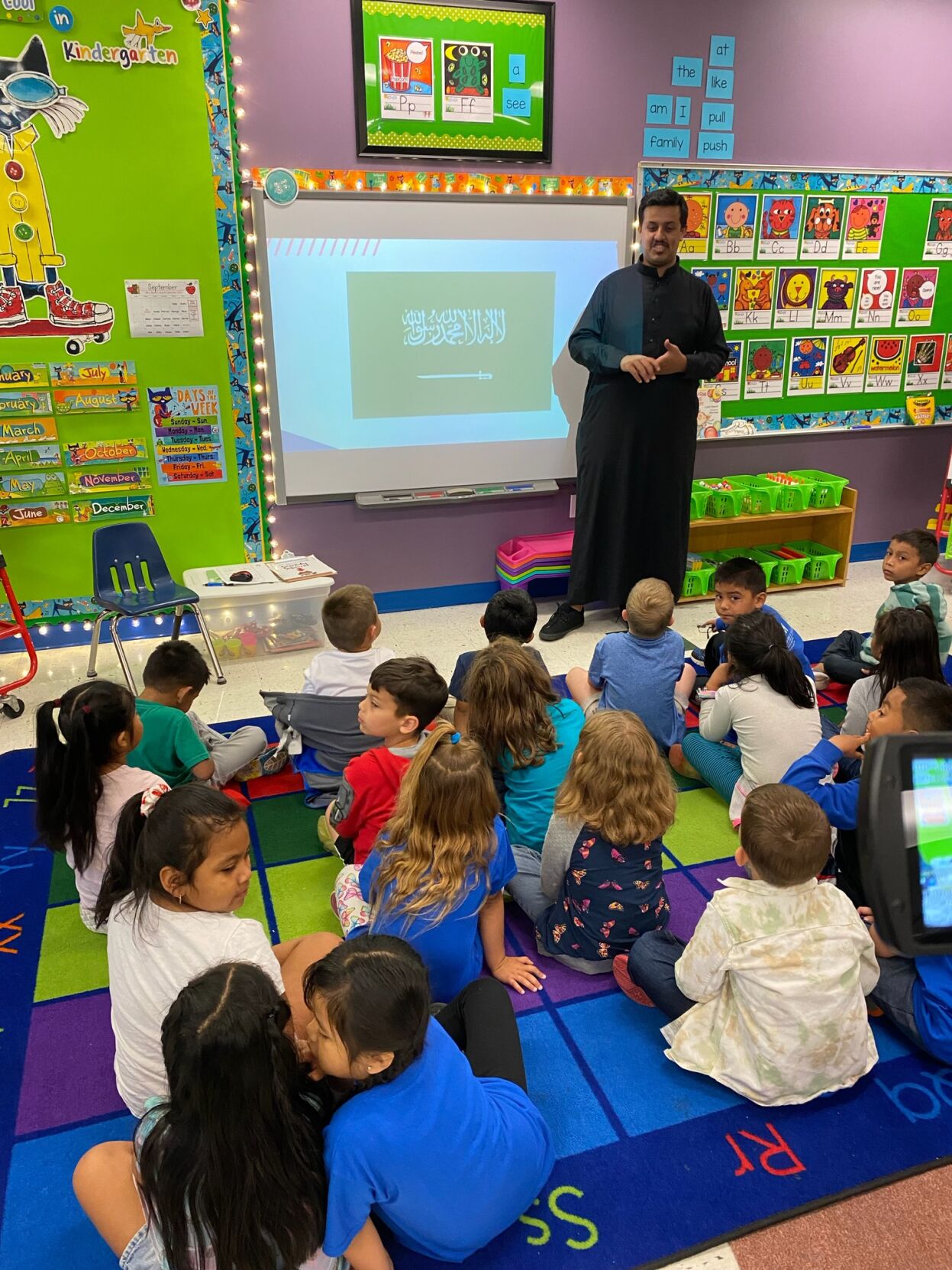 International and kindergarten students spend the day teaching each ...