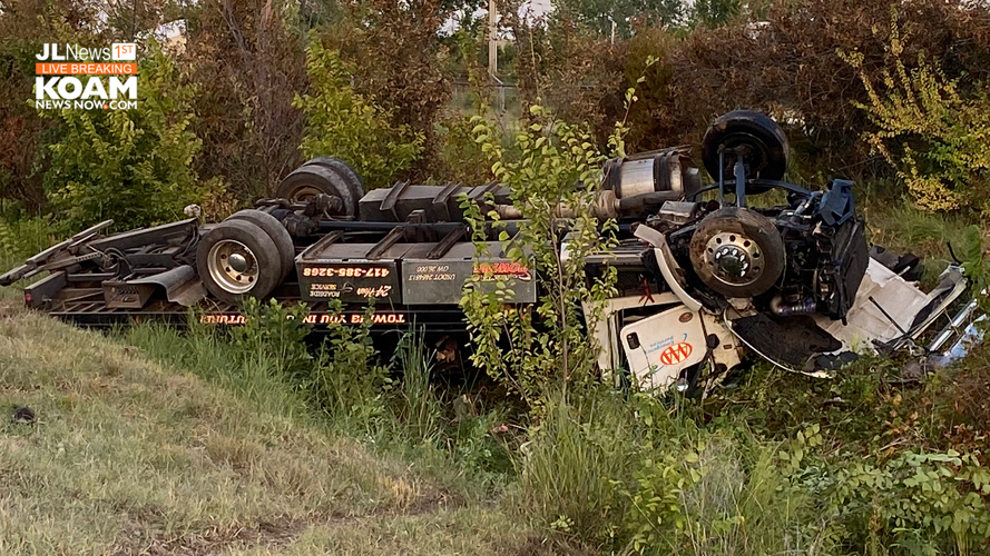 Loaded tow truck overturns after t-boning car at highway speeds ...