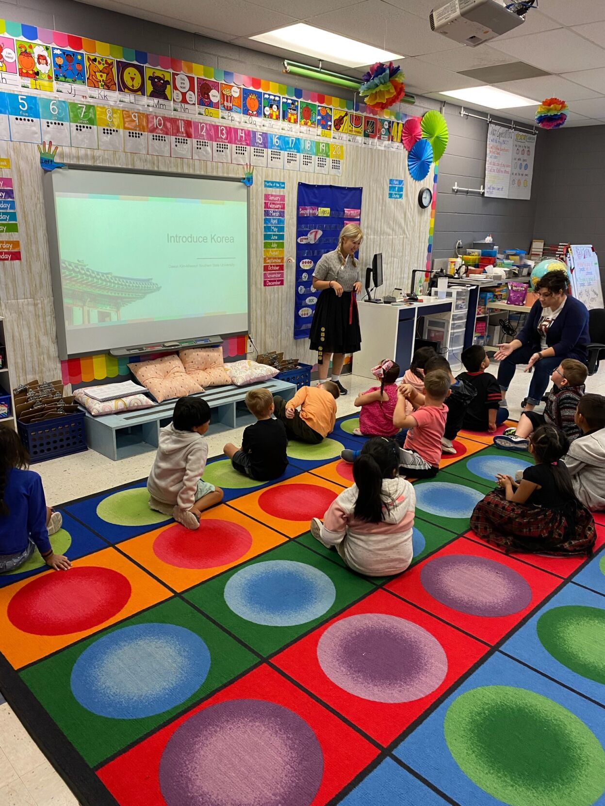 International and kindergarten students spend the day teaching each ...