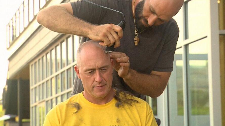 Missouri Southern football players, coaches shave heads in support of ...