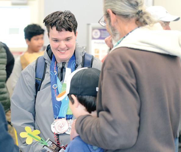 Special olympian returns with medals to show and stories to tell ...