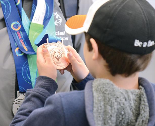Special olympian returns with medals to show and stories to tell ...