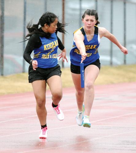 Track athletes greeted by rain, wind on The Rock | Local Sports ...