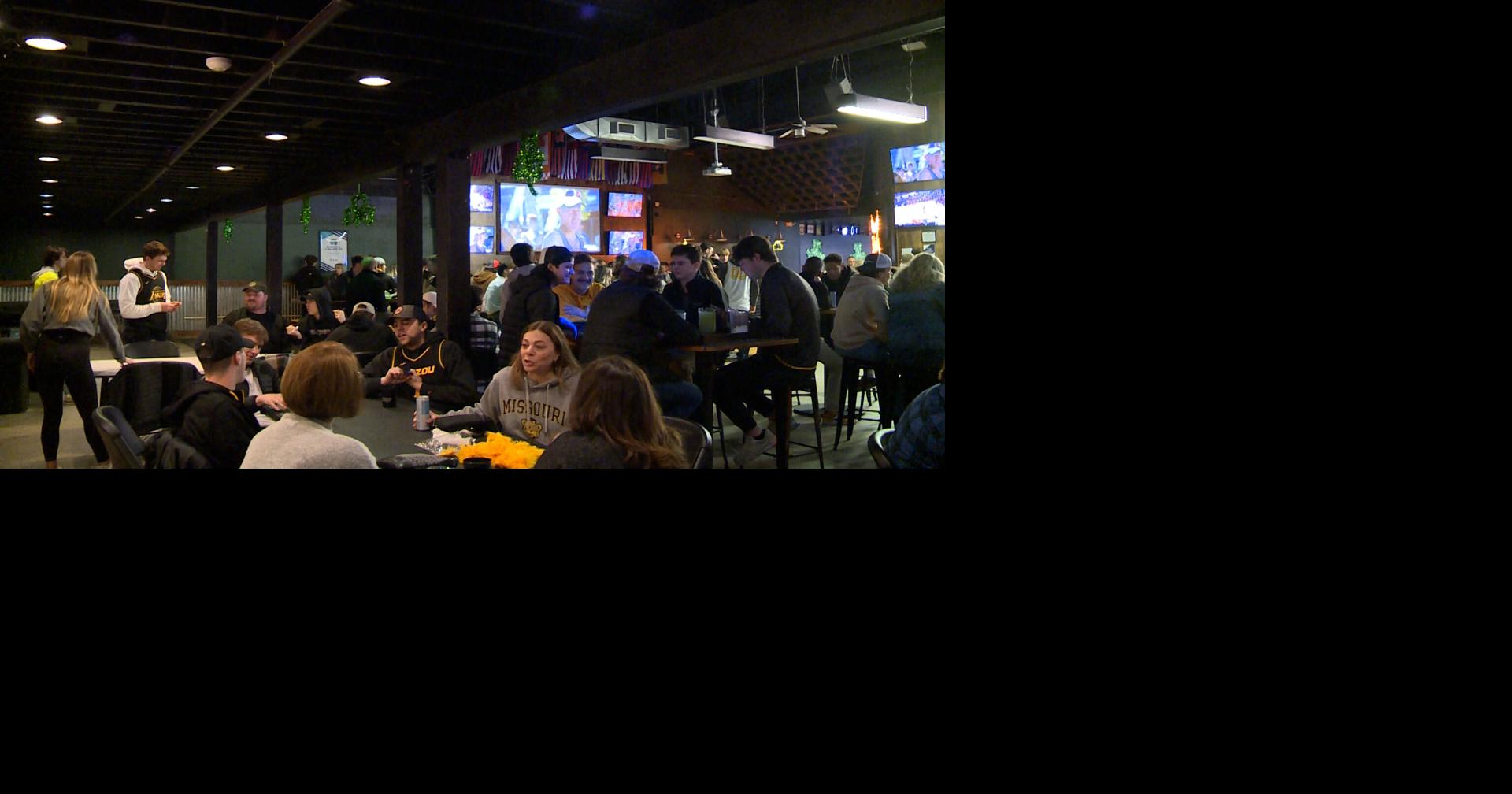 Tiger fans in downtown Columbia cheer on Mizzou in the NCAA March ...