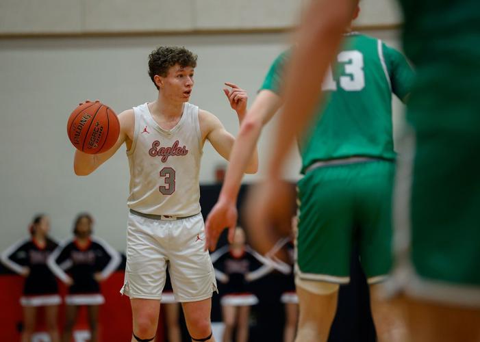 Two wrestlers triumph at state; basketball finishes regular season ...