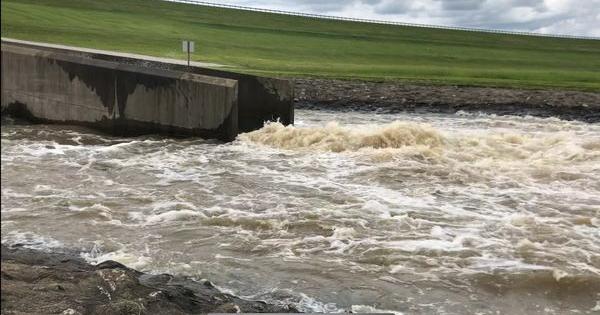 Long Branch Dam reaches record height releases water | News | komu.com