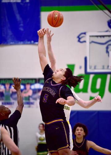 Hickman boys hoops upends Rock Bridge to win district championship ...