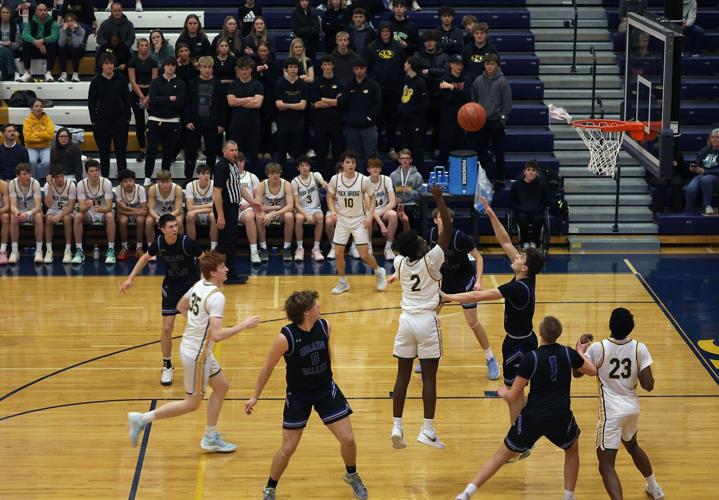 Rock Bridge boys basketball outlasts Grain Valley in 4OT district ...