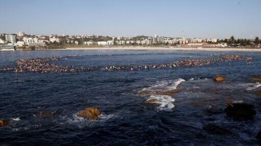 Hundreds swim, float at Bondi Beach to honour shooting victims ...