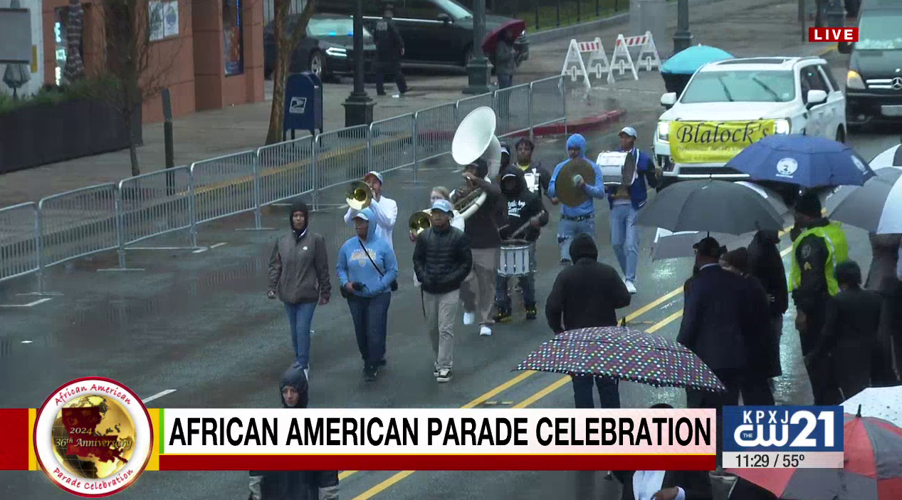 Thousands brave the rain to celebrate Black History Month at African ...