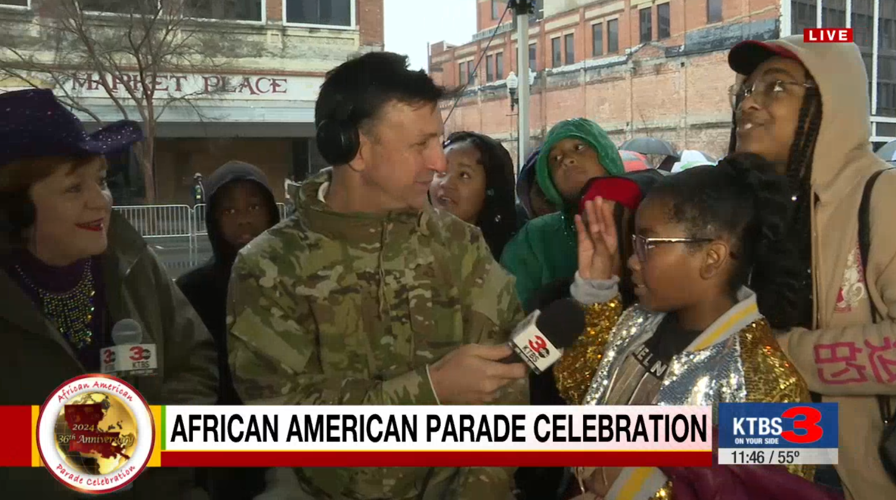 Thousands brave the rain to celebrate Black History Month at African ...