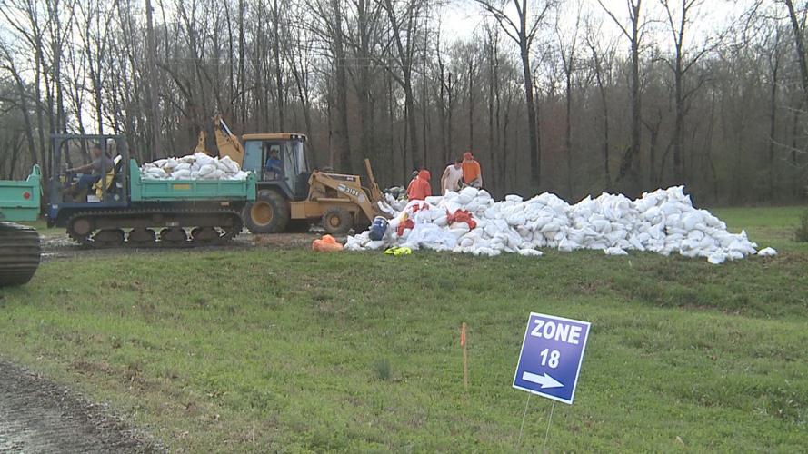 Sandbags are being used to build up the Red Chute Levee in Bossier ...