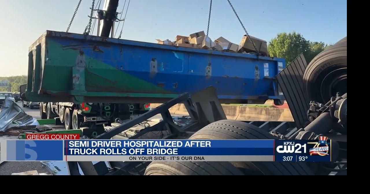 Driver hospitalized after Amazon 18-wheeler goes off bridge, blocking ...