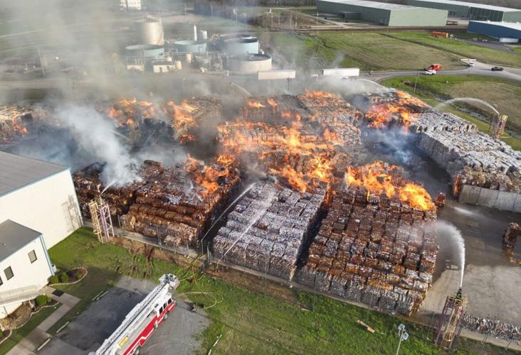 Fire crews battle massive wind-driven blaze at The Port of Caddo ...