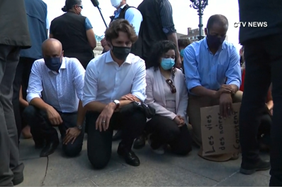 Canadian Prime Minister Justin Trudeau takes a knee to support anti ...