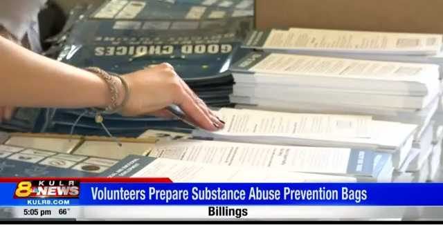 Volunteers assemble 9,000 substance abuse, mental health resource bags ...