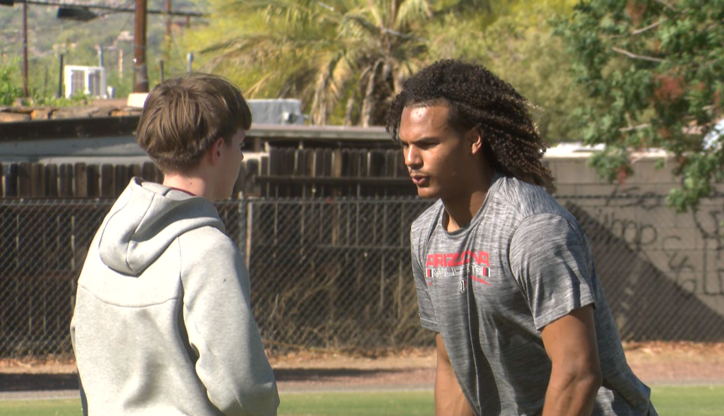 Arizona's Genesis Smith mentors next generation with R.I.S.E. Football Camp | News | kvoa.com