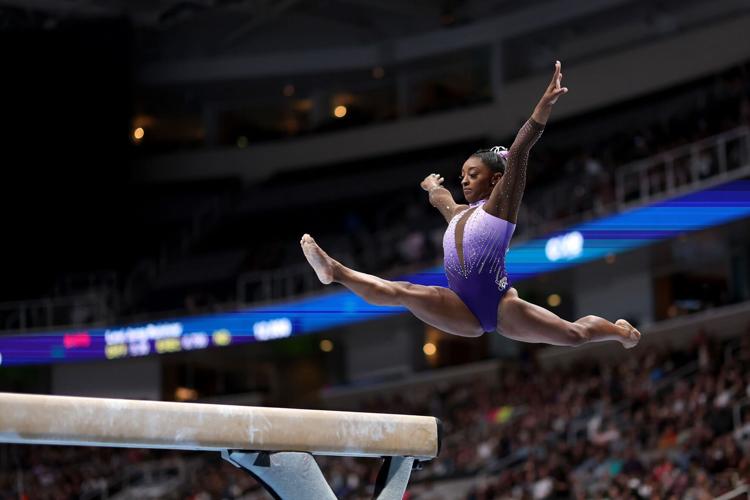 Simone Biles makes history after winning a record 8th all-around ...