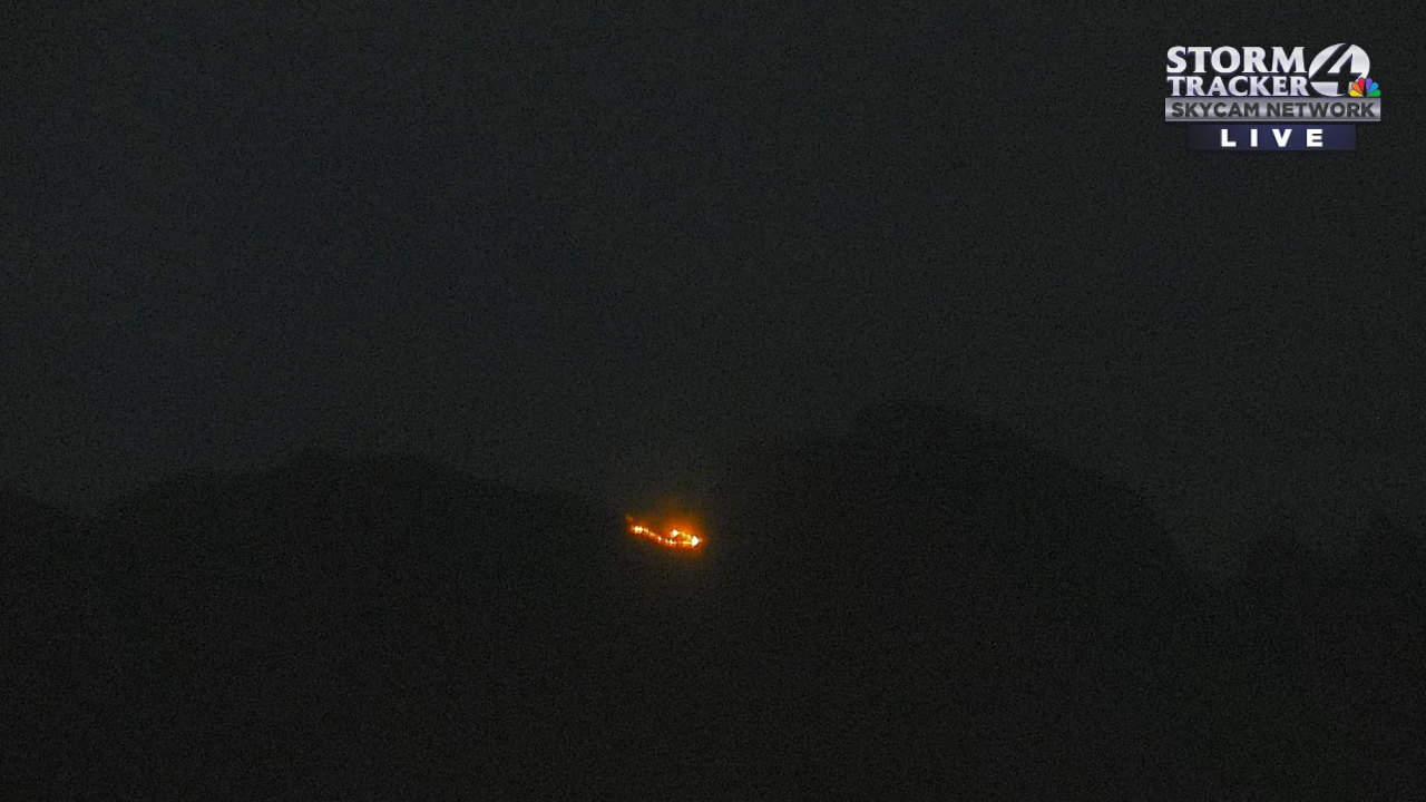 Table Mountain fire flares up after burning tree rolls downhill | Local ...