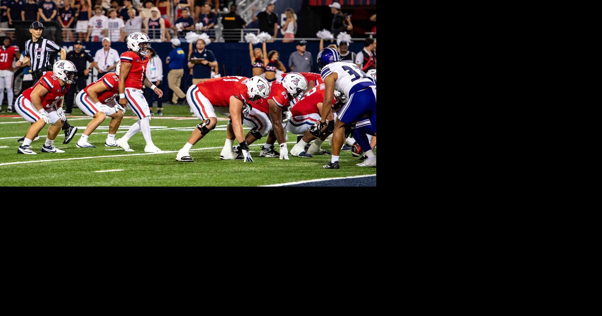 PHOTOS: Arizona storms past Weber State after two-hour weather delay ...