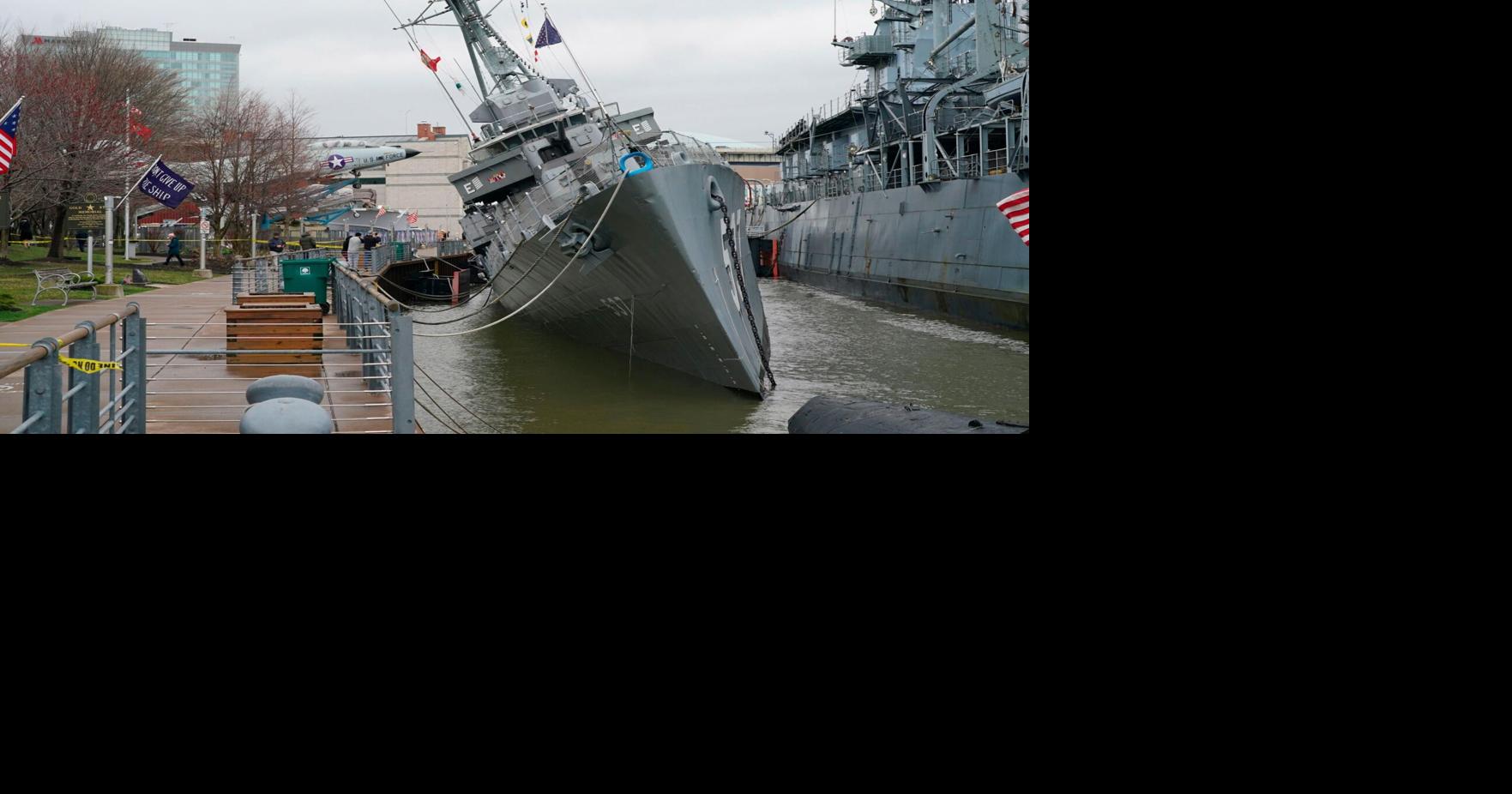 WWII-era ship tilting into Lake Erie in Buffalo, New York, naval park ...
