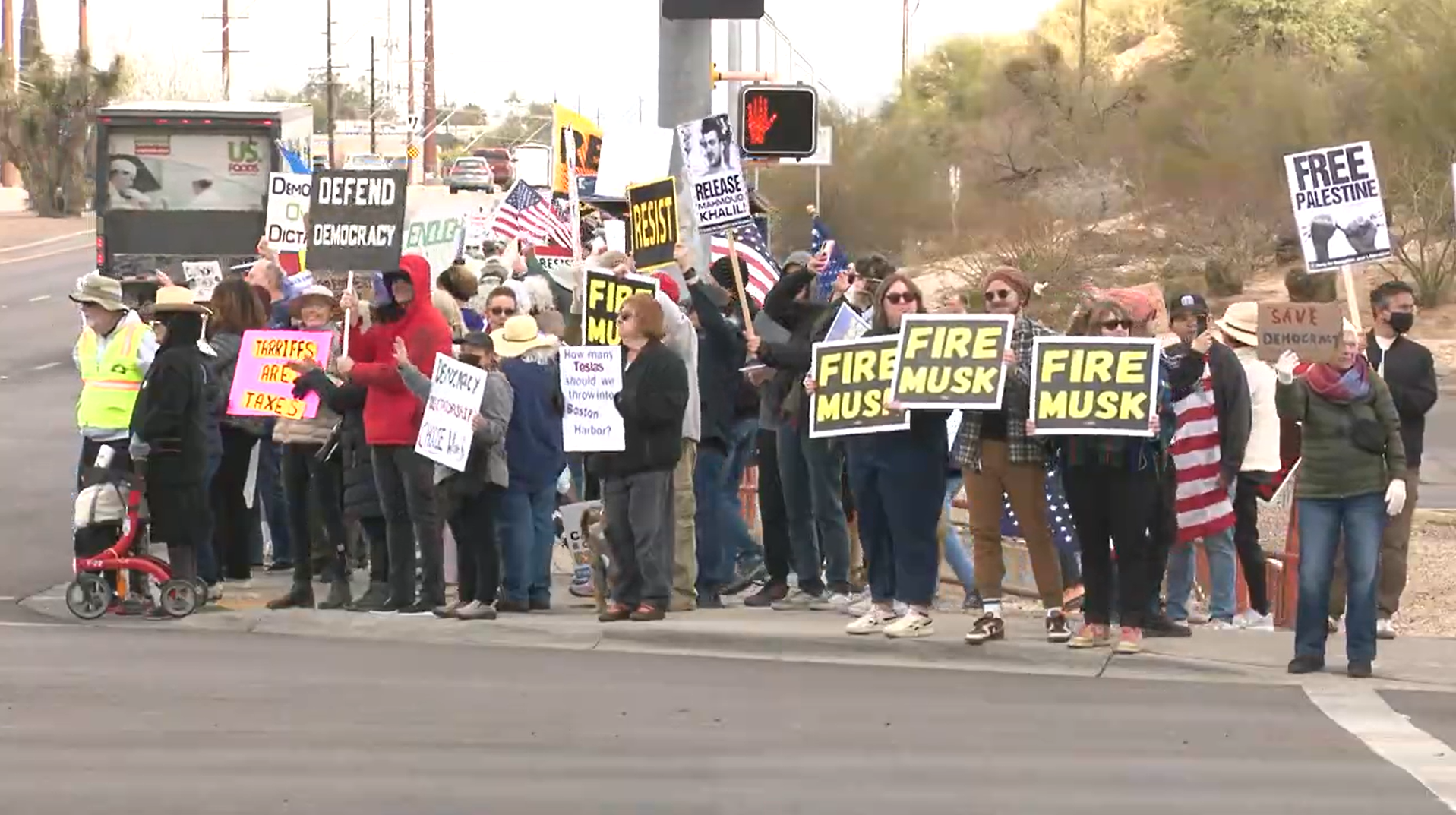 Protesters gather outside of Tucson Tesla dealership | Local News ...