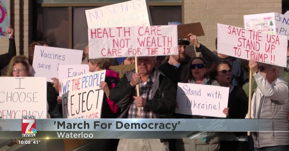 Protesters march outside congressional offices in Waterloo | Waterloo ...