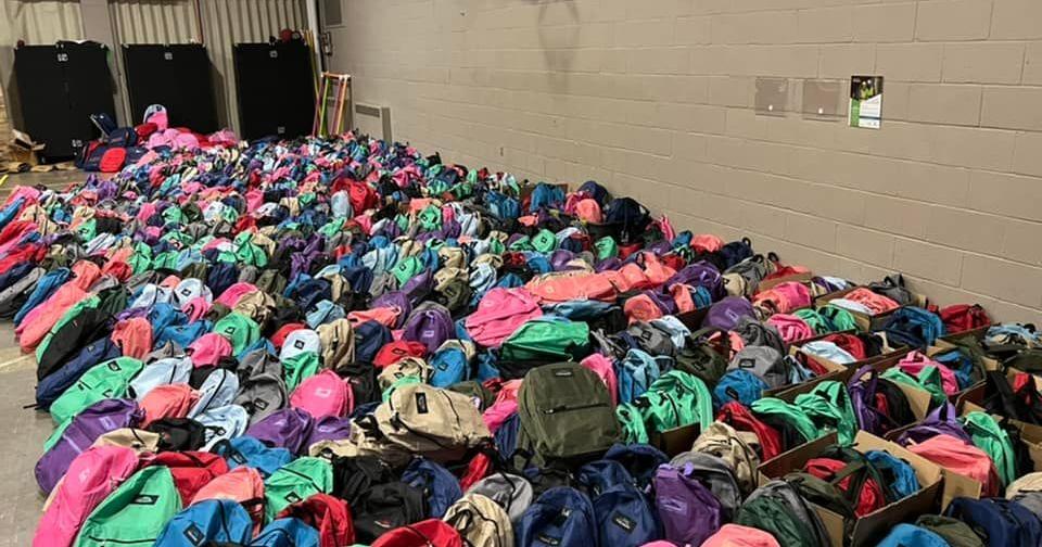 Cedar Valley Jaycees gives away hundreds of backpacks in six minutes ...