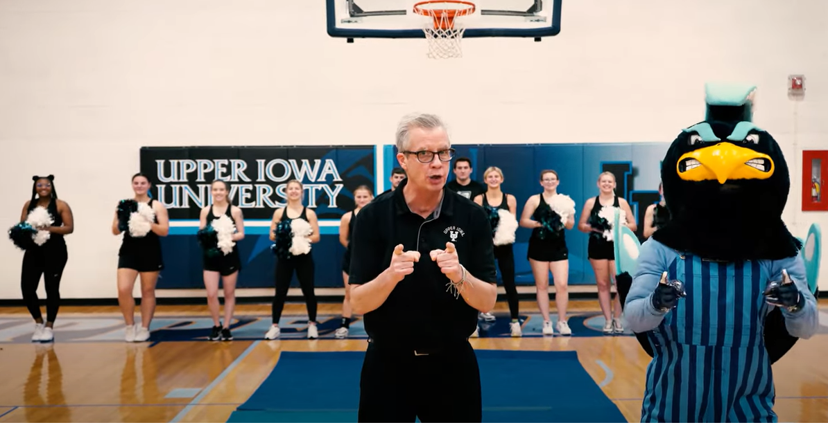 Upper Iowa University cheers on their fellow Peacocks, Saint Peter's in ...