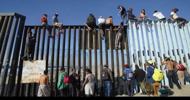Footage shows migrants detained immediately after crossing the border ...