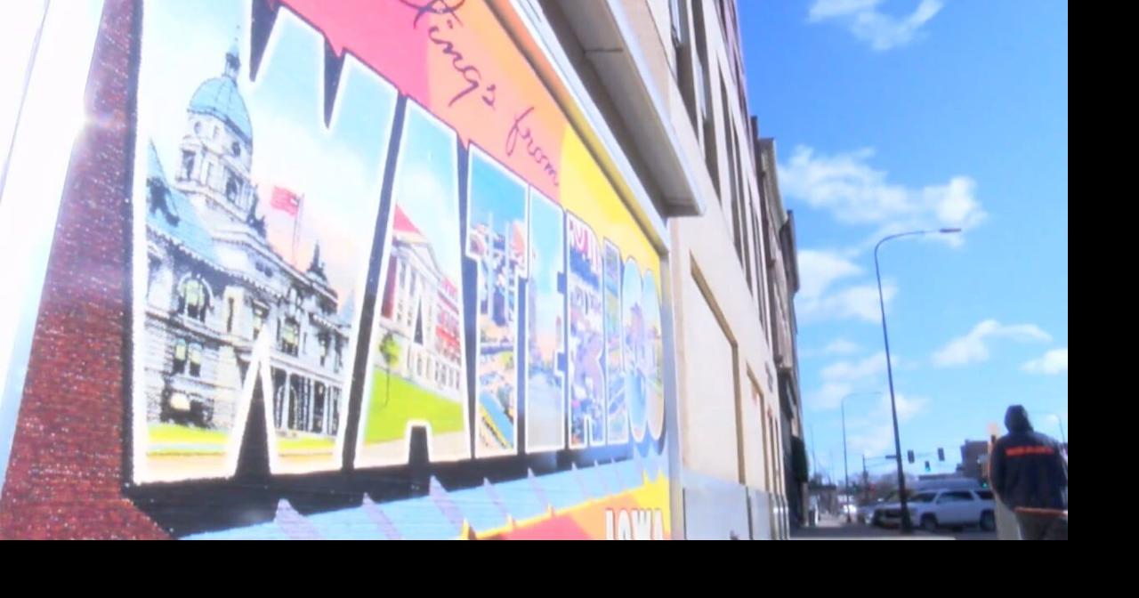 Downtown Waterloo mural restored after crash damage | Video | kwwl.com