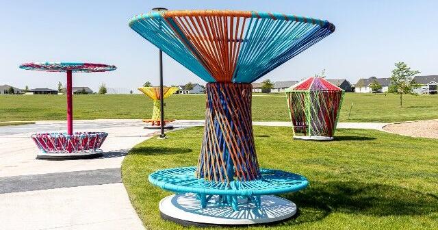 Giant spinning tops pop up at North Liberty's Centennial Park | News ...