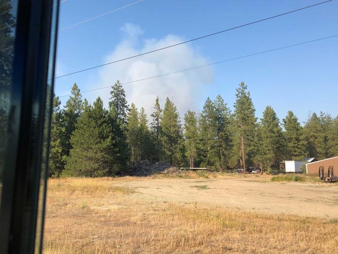 Evacuations downgraded for people living near wildfires in north ...