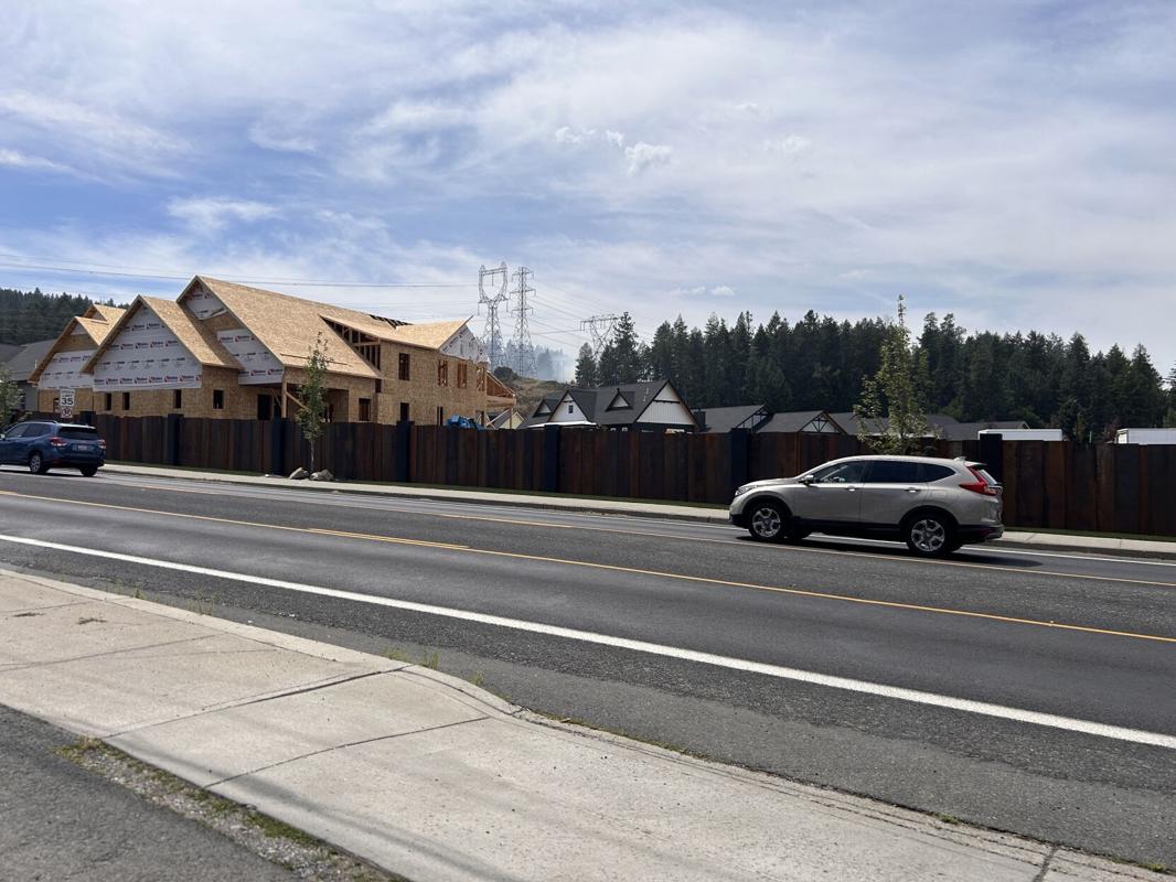 FIRE WATCH: Firefighters contain brush fire in North Spokane, road ...