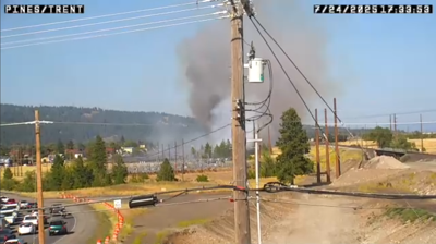 Crews working to put out brush fire along Trent Avenue in Spokane ...