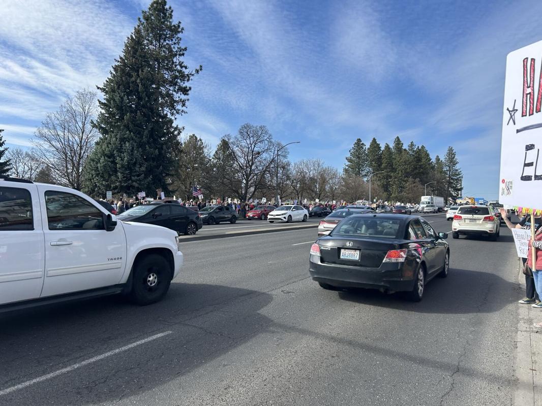 Protest against President Trump and Elon Musk draws hundreds in Spokane ...