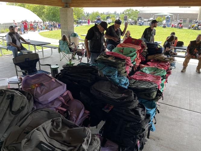 Local motorcycle club provides free backpacks and school supplies to ...