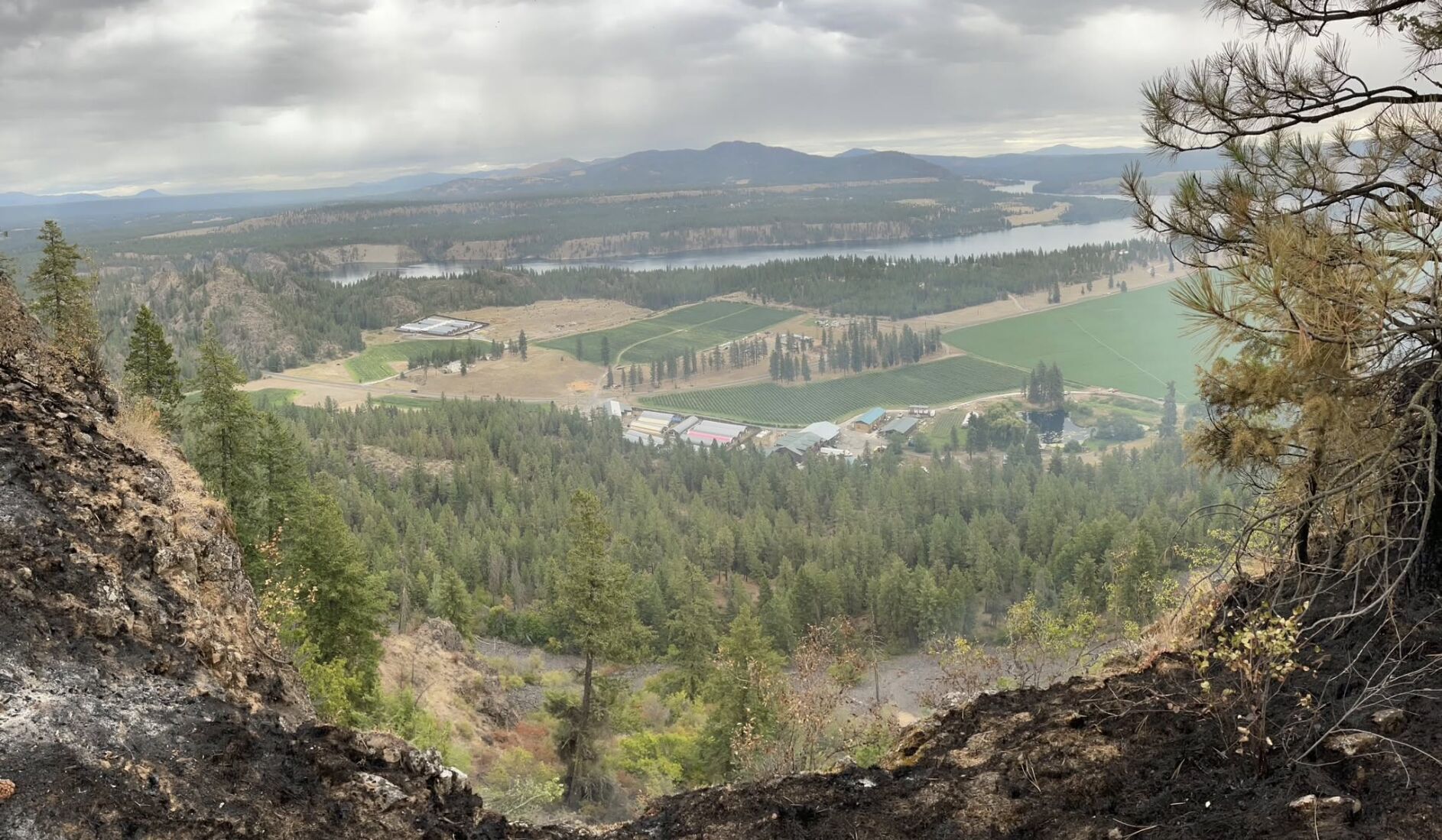 Evacuations still in place as containment grows for wildfire near ...