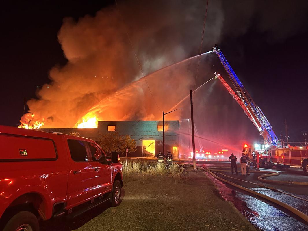 Firefighters battle large warehouse fire east of downtown Spokane ...