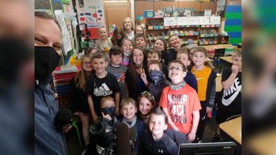 Indiana second graders help Keith Osso come up with adjectives to ...