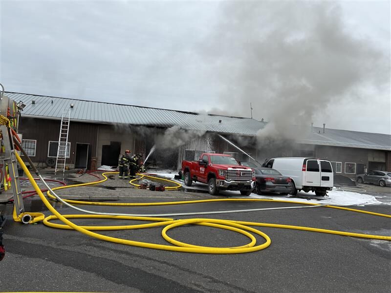 Fire spreads through multiple businesses in North Spokane auto shop ...