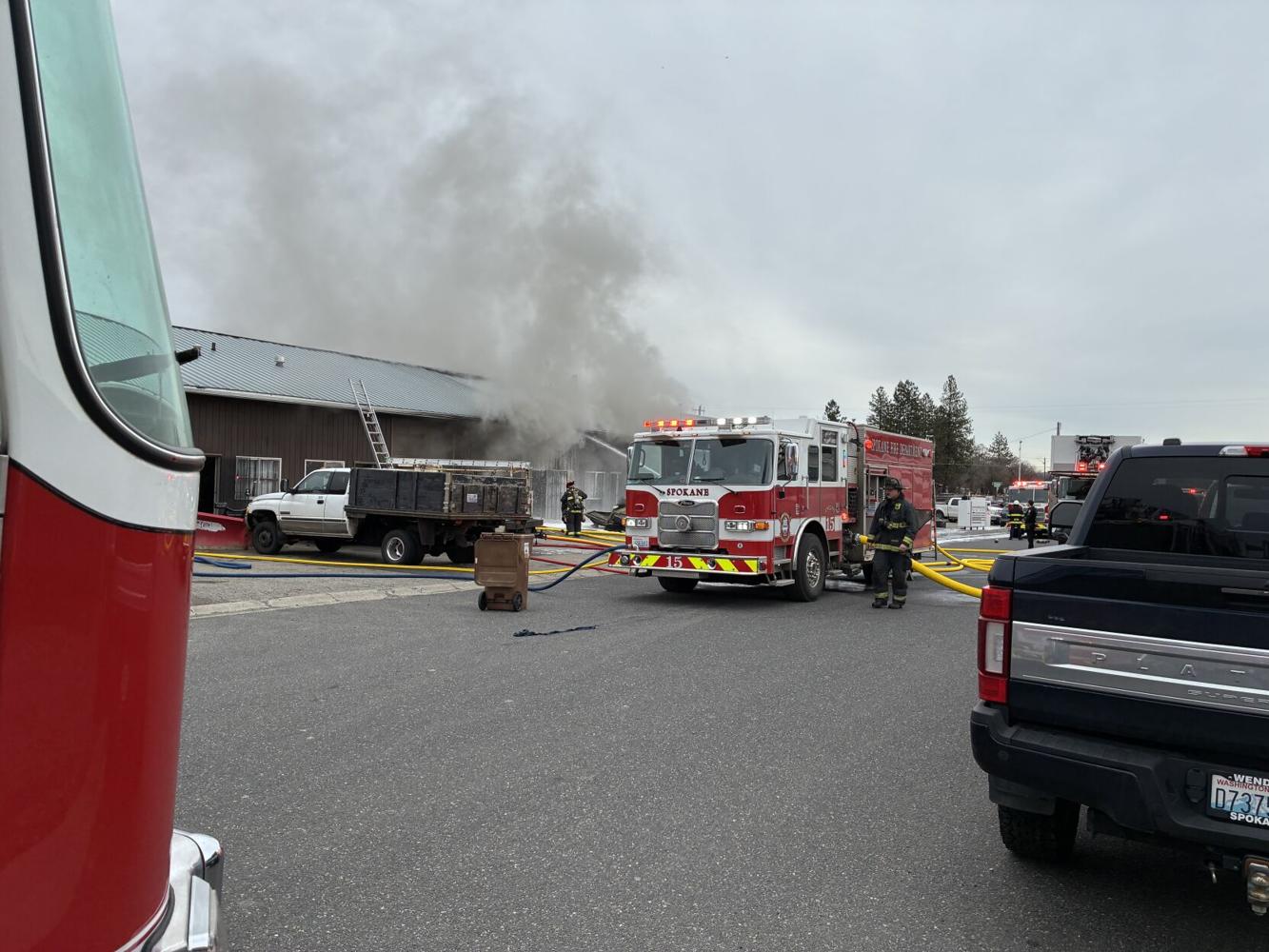 Fire spreads through multiple businesses in North Spokane auto shop ...