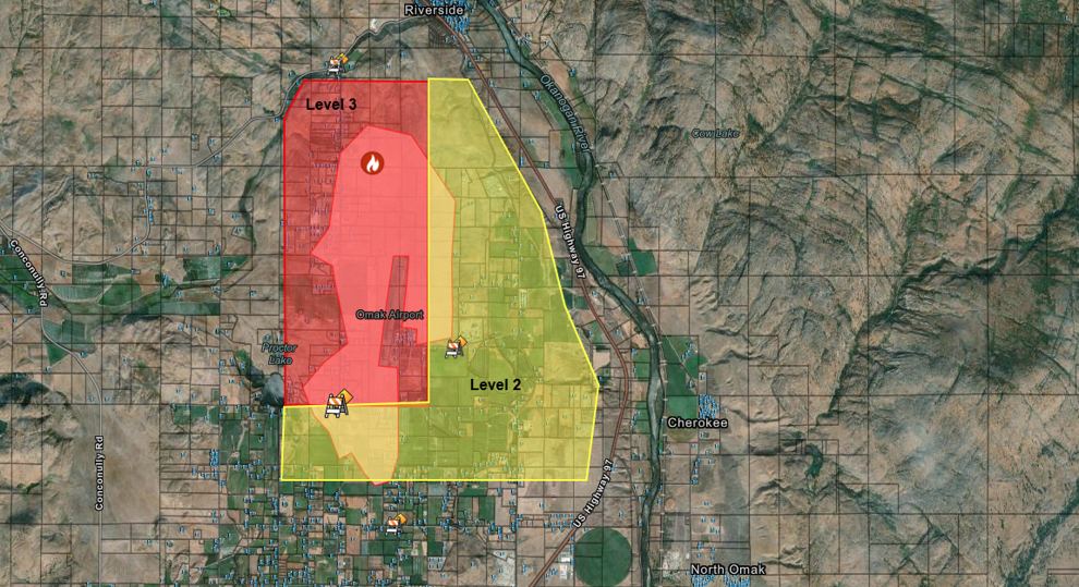 Evacuations lowered for wildfire burning near Omak Airport | News ...