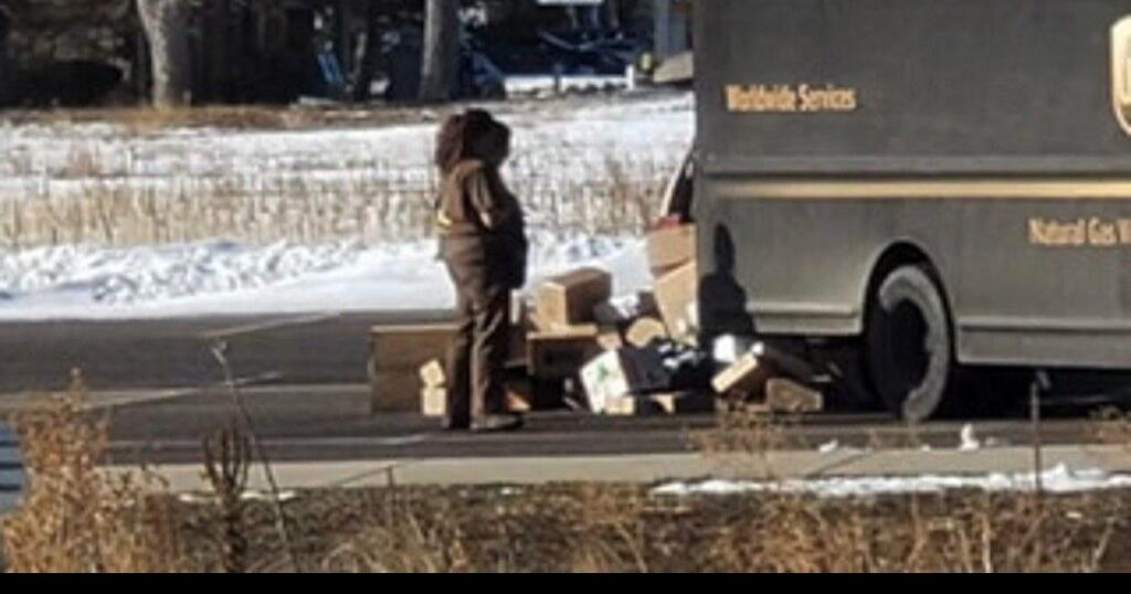 UPS delivery driver caught on camera throwing packages out of truck ...