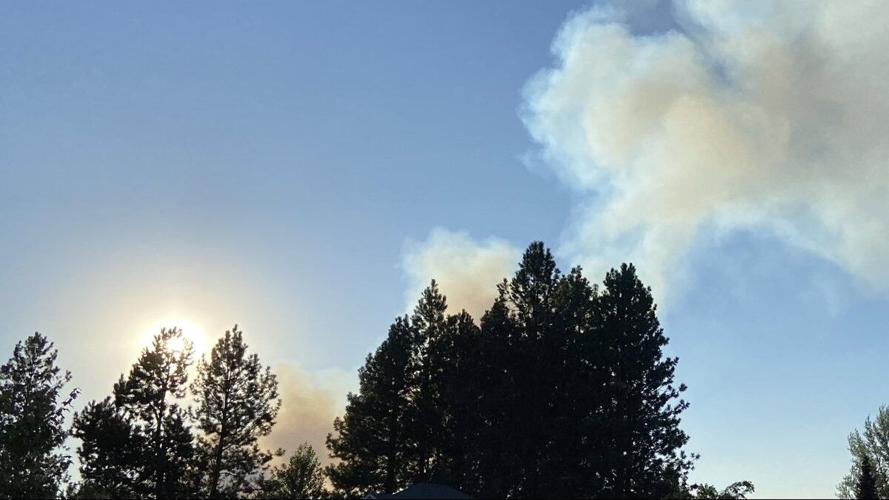 Evacuations downgraded for people living near wildfires in north ...