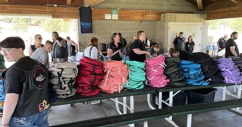 Local motorcycle club provides free backpacks and school supplies to ...