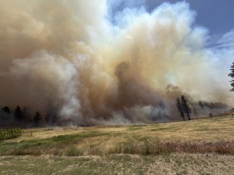 Emergency responders expand evacuation zone for fast-moving fire east ...