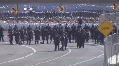 Busy border crossings reopen after migrants rush border | National ...