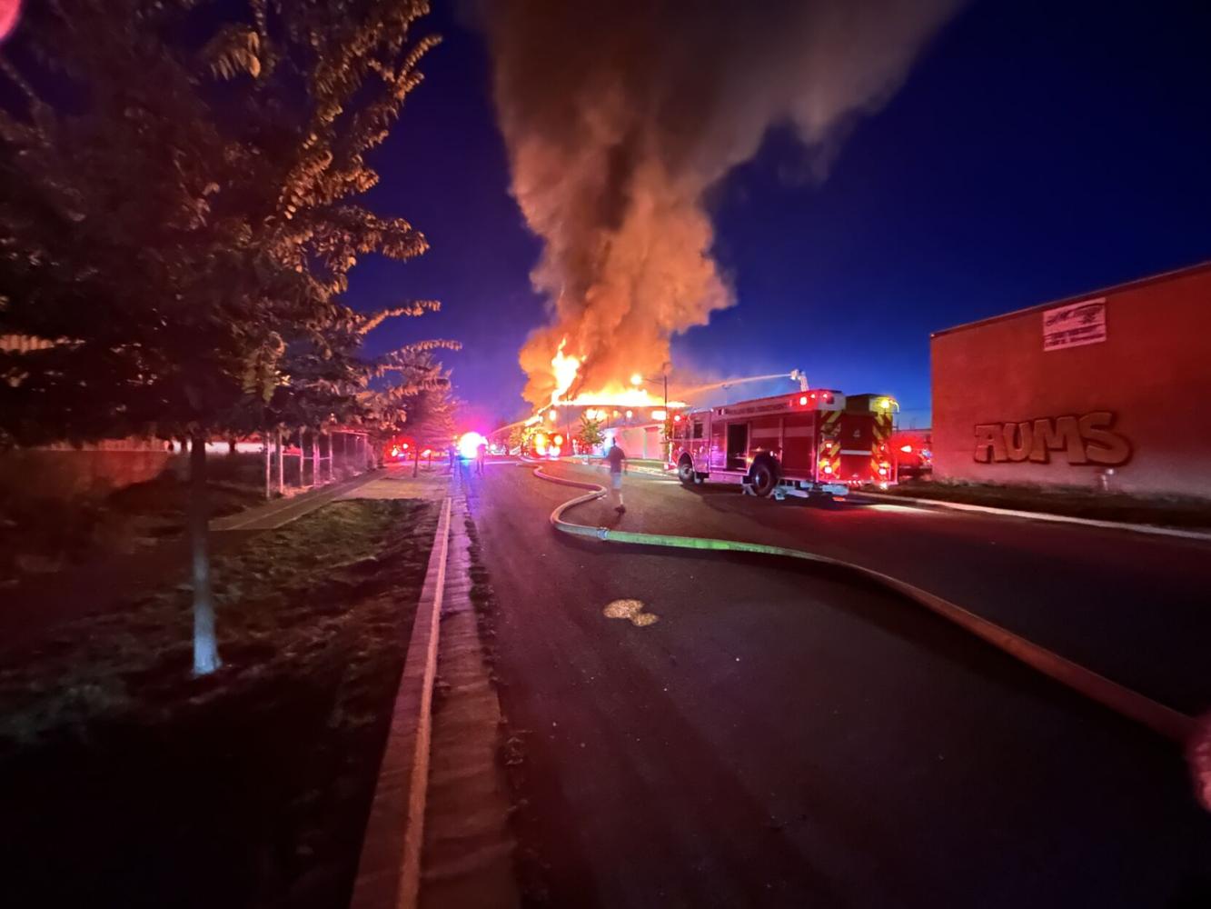 Firefighters battle large warehouse fire east of downtown Spokane ...