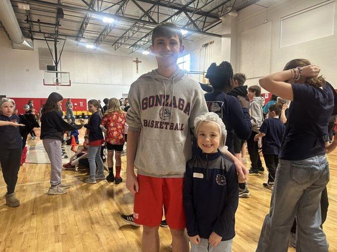 Zags fans of all ages cheer on the Bulldogs across Spokane for the ...